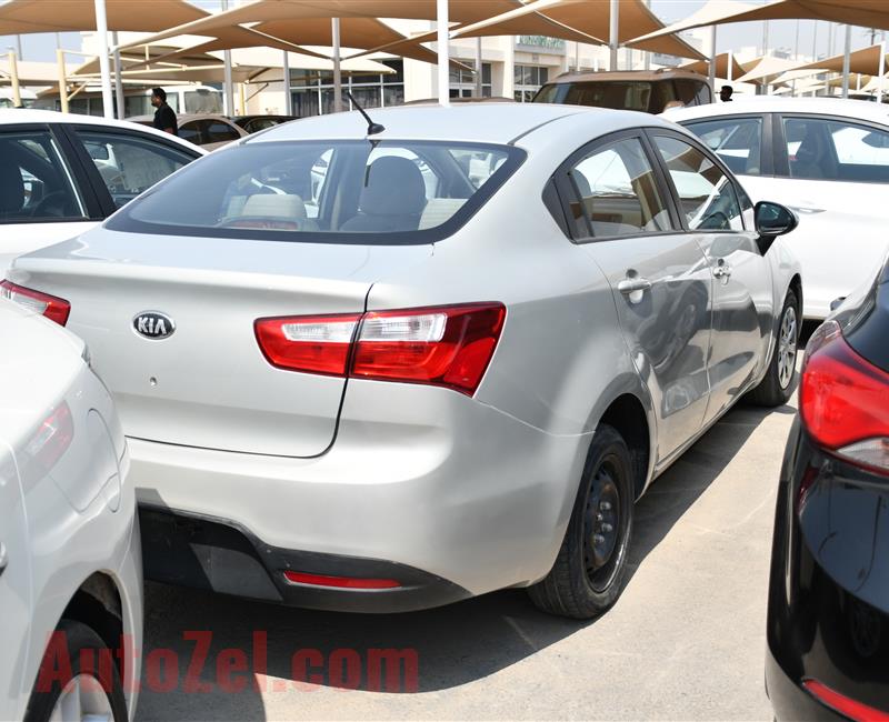 KIA RIO- 2015- SILVER- 100 000 KM- GCC :: AutoZel.com